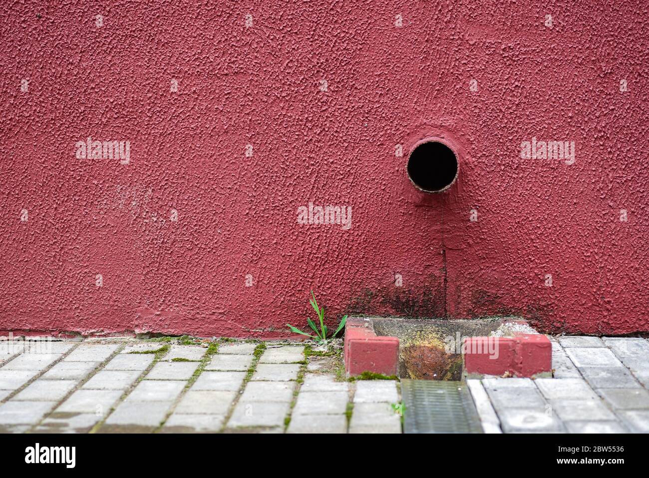 Storm sewage on the wall of the building Stock Photo - Alamy