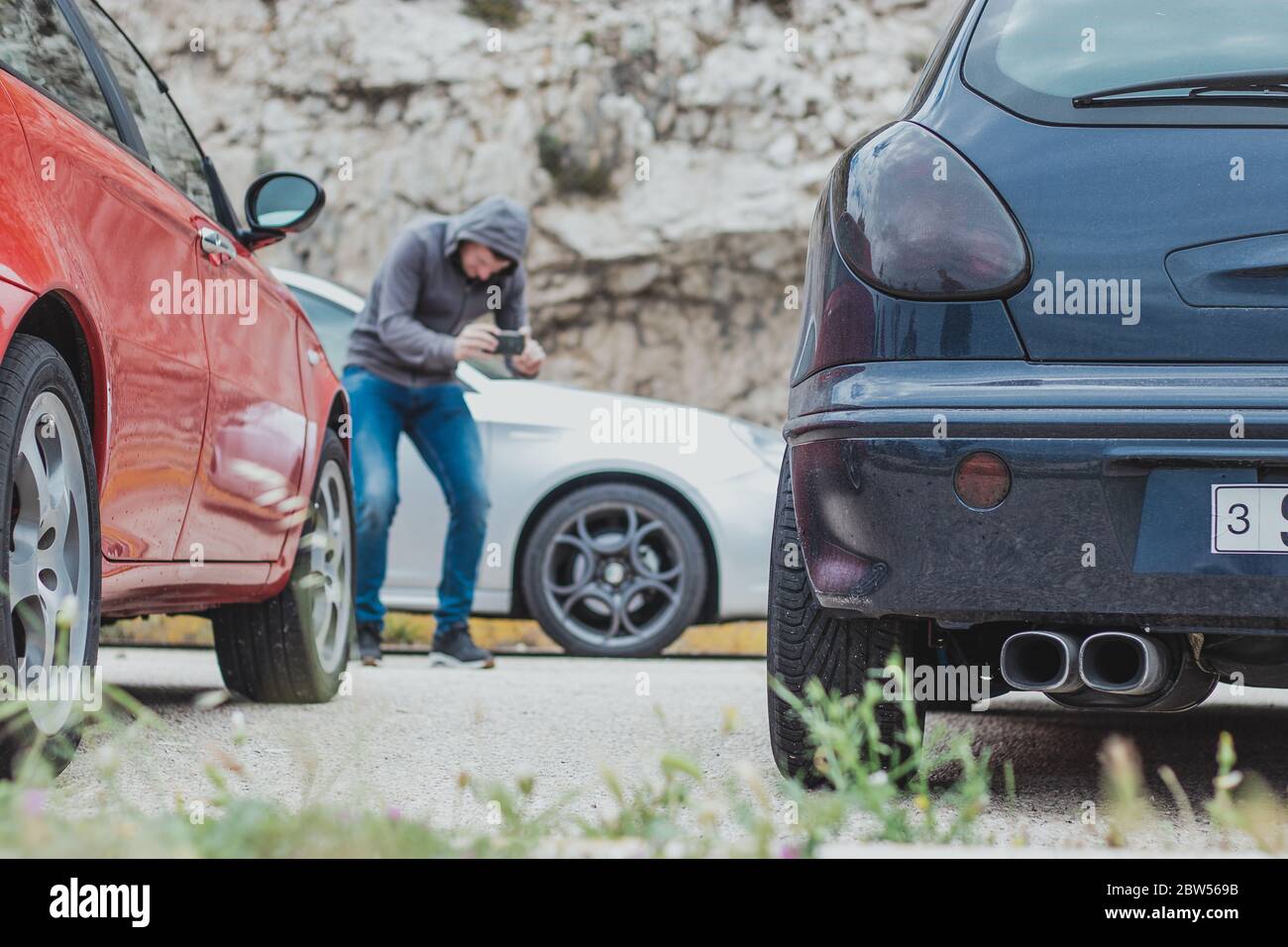 Male crouching for picture hi-res stock photography and images - Alamy