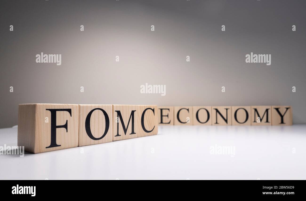 FOMC Meeting Minutes word over Candlestick chart Forex background ...