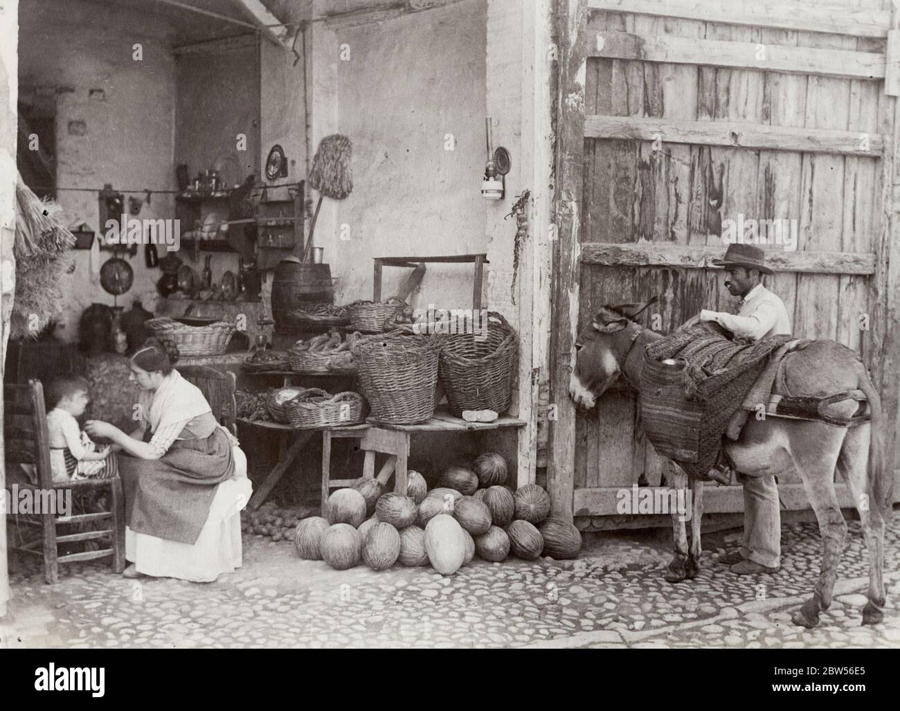 Vintage 19th century photograph - rural scene in Spain, fruit stall ...