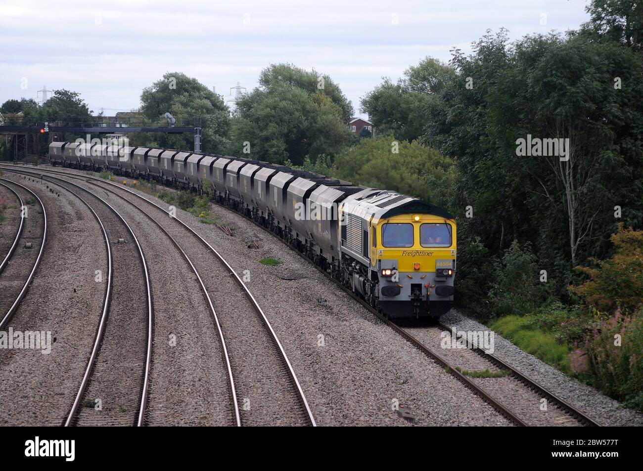 66504 heads west at Magor with a loaded M.G.R Stock Photo - Alamy