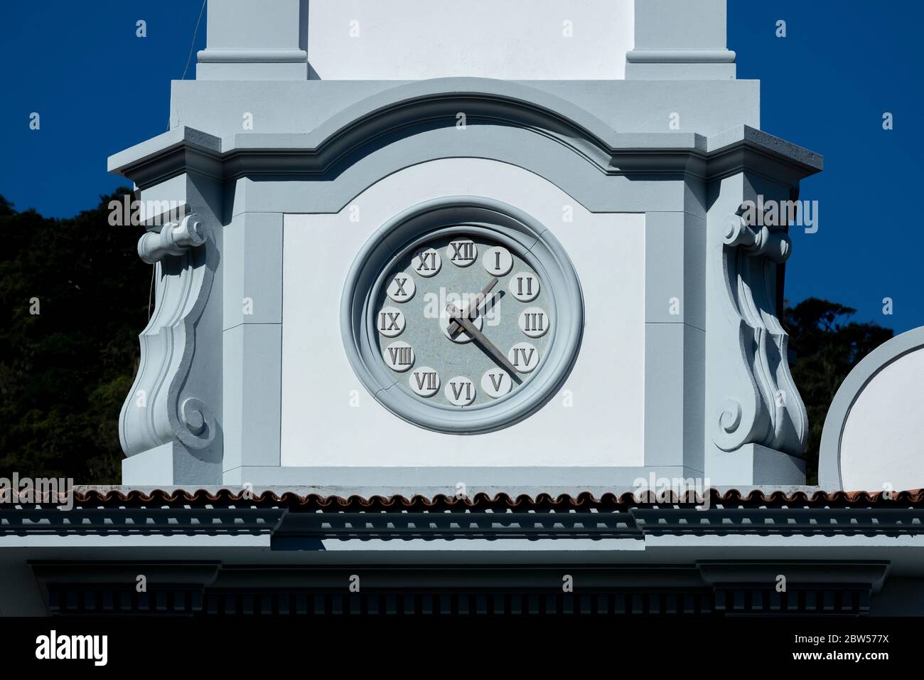 Clock on the bell tower with details in bright sunny light part of the ...