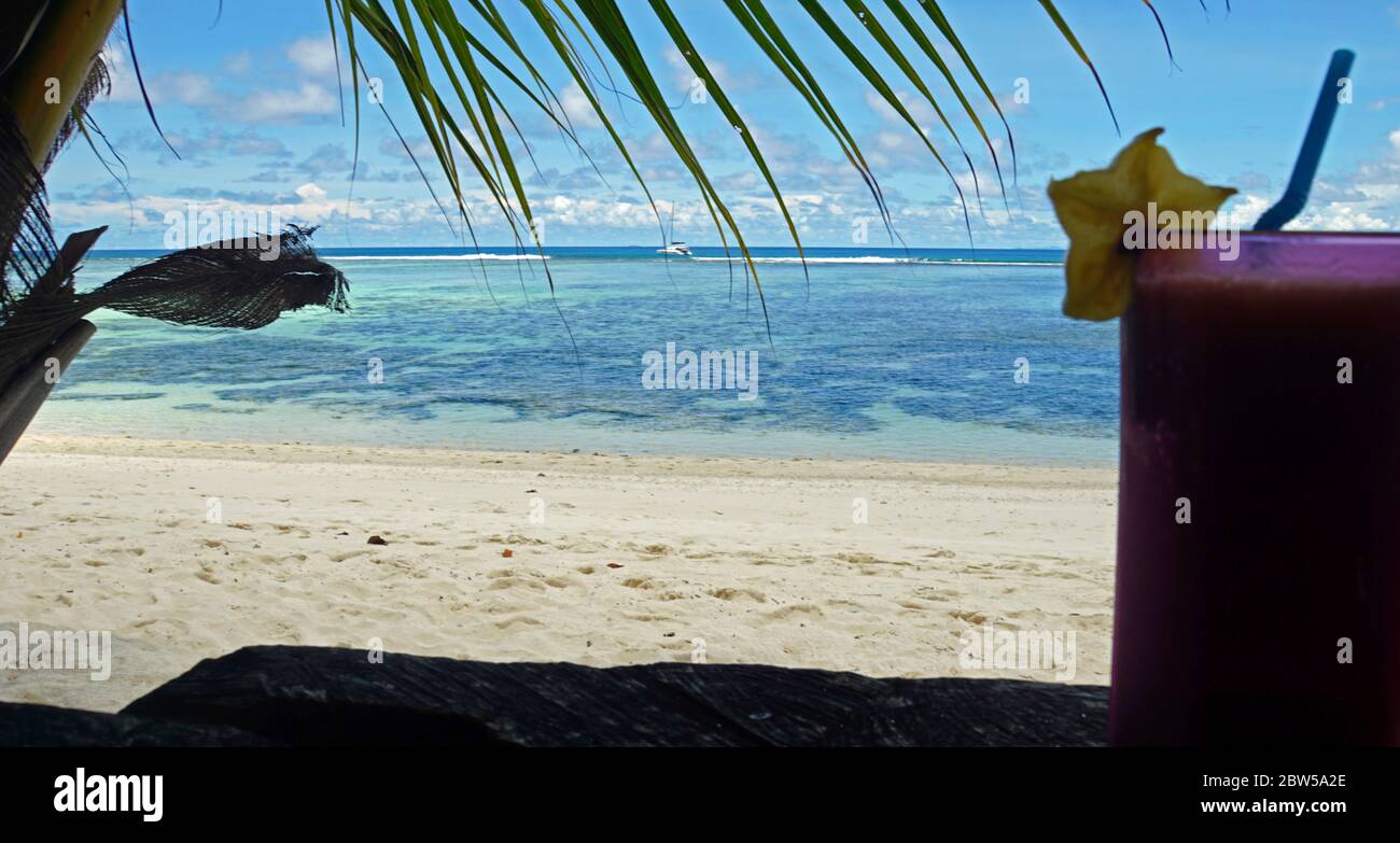 cold cocktail at a tropical beach at the seychelles islands Stock Photo ...