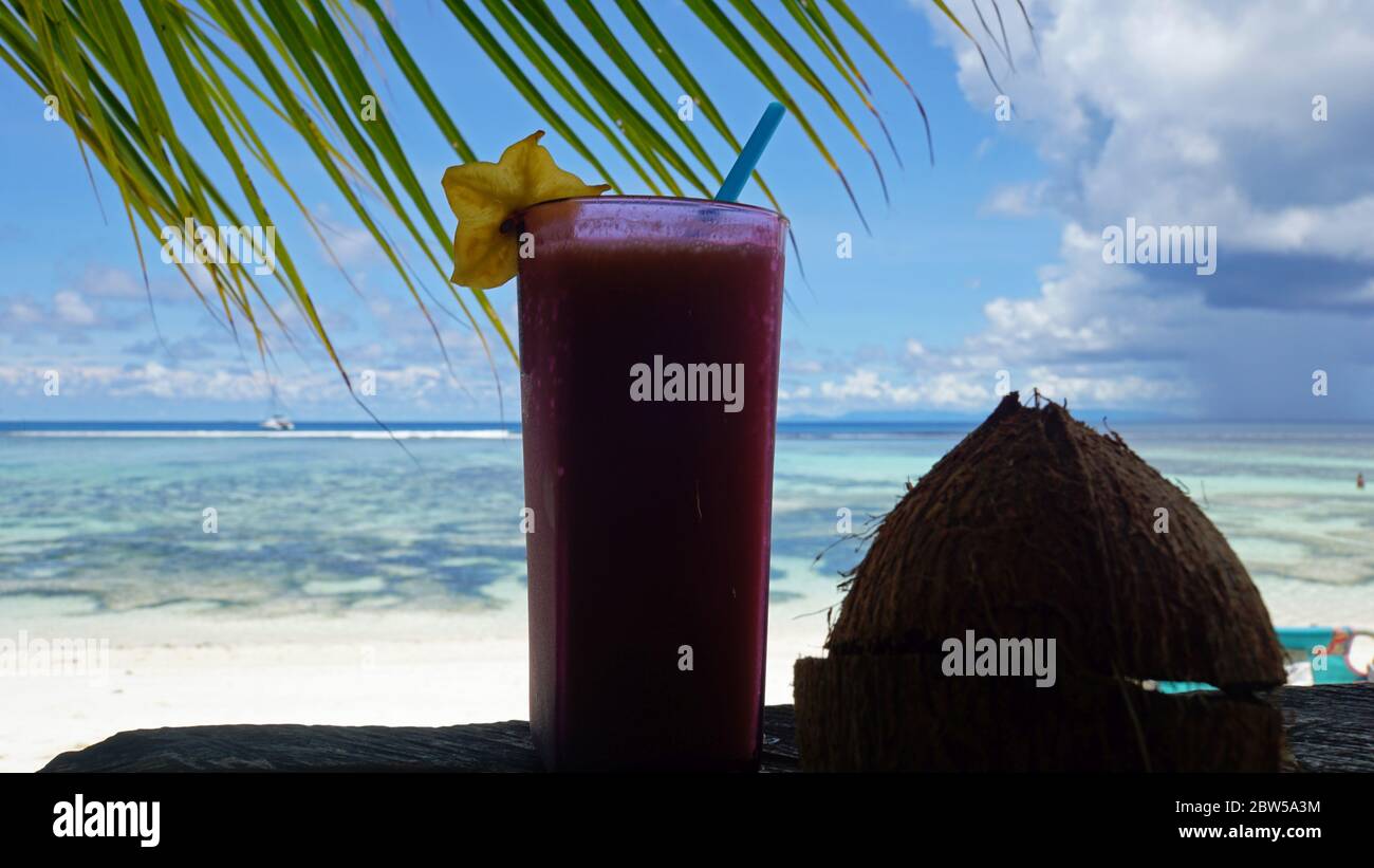 cold cocktail at a tropical beach at the seychelles islands Stock Photo ...