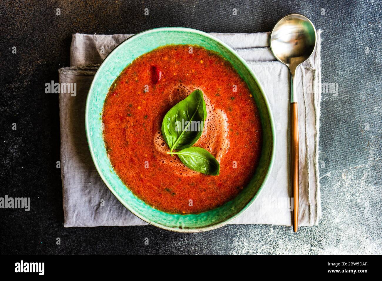Traditional spanish tomato soup Gazpacho derved in ceranic bowl with ...