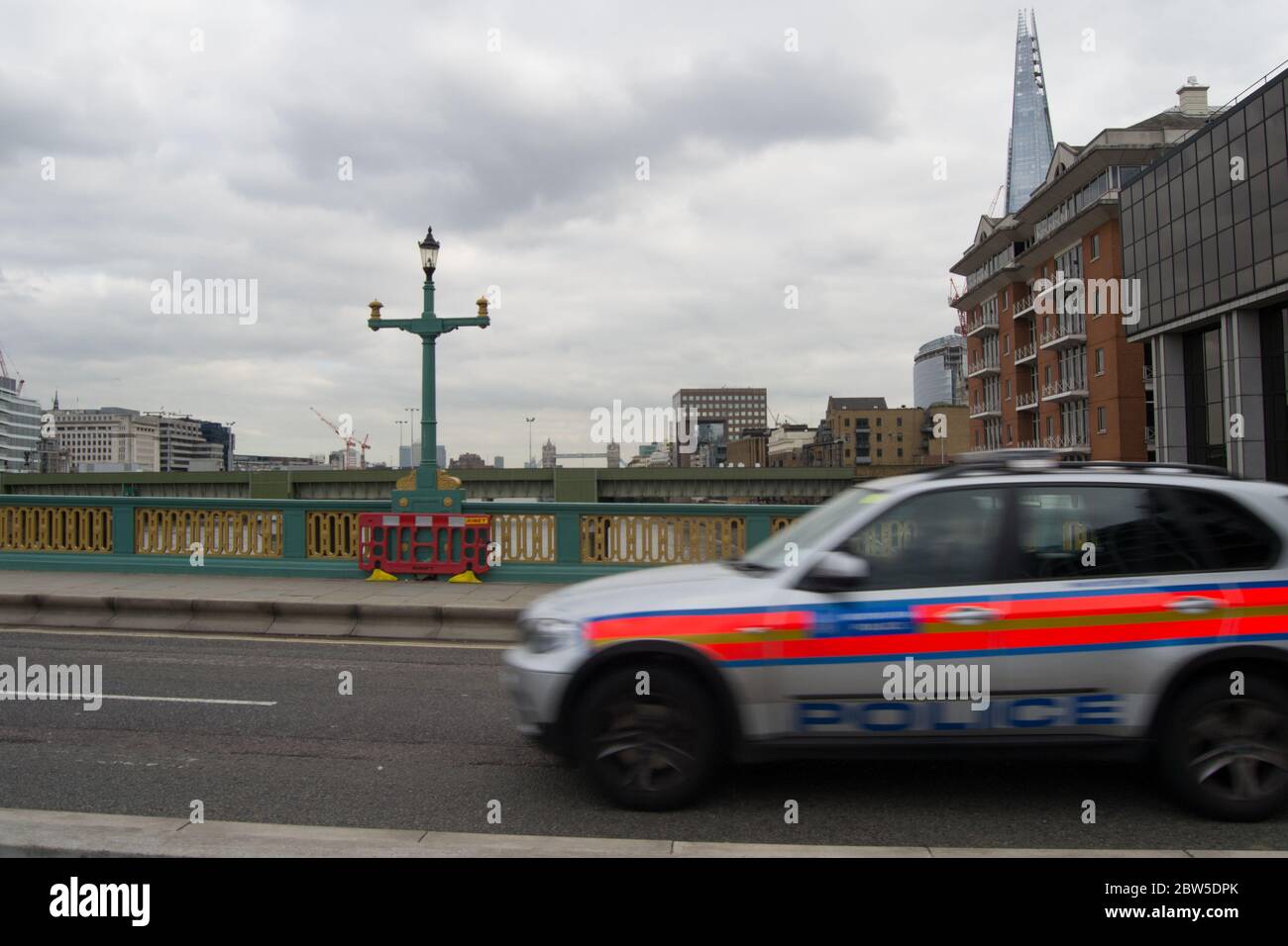 British police car driving fast on a bridge in London Stock Photo - Alamy