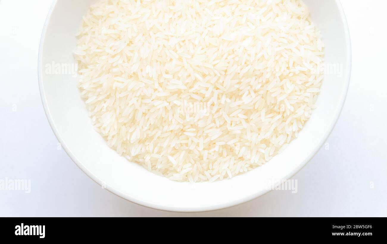 An overhead shot of dry white rice against a white background Stock ...