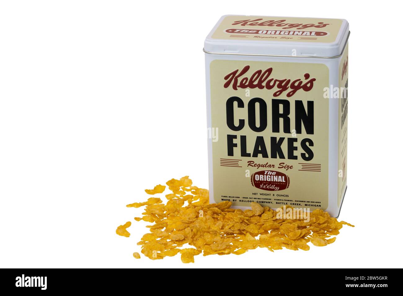 Close up view of fallen metal jar with cornflakes on white background ...