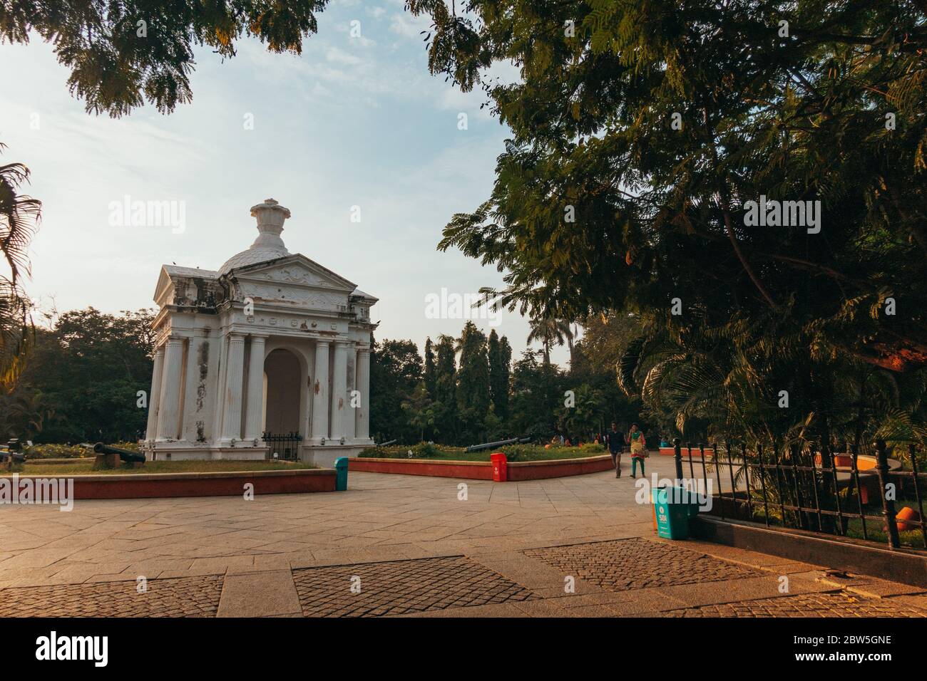 Sun sets behind a Greco-Roman arch in the centre of Bharathi Park ...