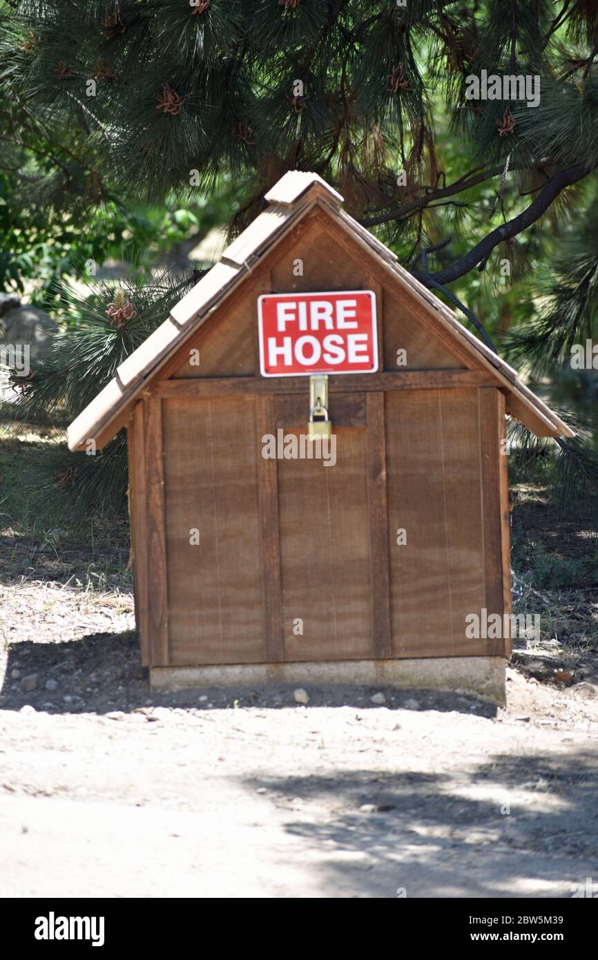 Fire Hose Building in Forest Stock Photo - Alamy