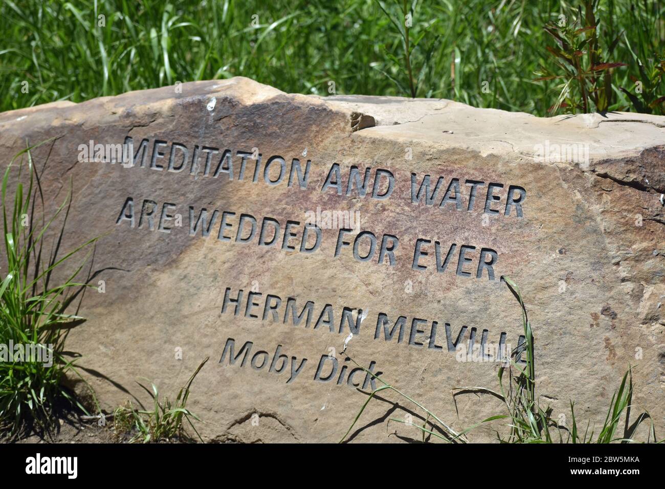 Rock Signage with Quote Stock Photo - Alamy