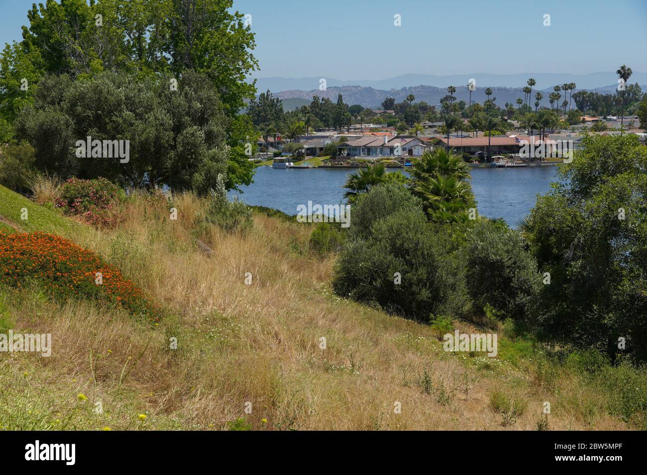 View from a grassy open space across Lake San Marcos in California to ...