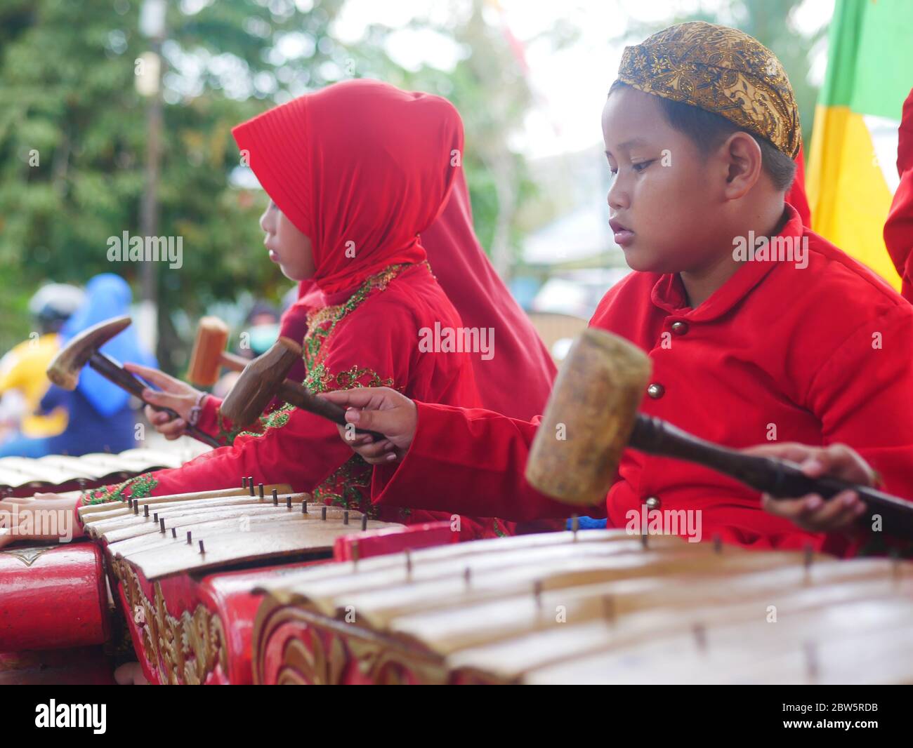 Children playing musical instruments hi-res stock photography and ...