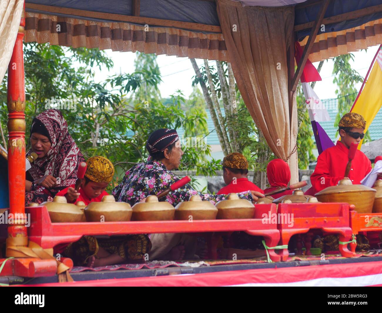 Young children playing musical instruments hi-res stock photography and ...