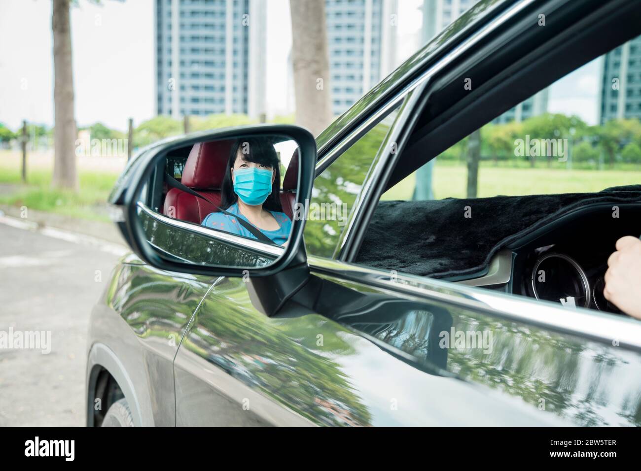Driver in medical mask driving hi-res stock photography and images - Alamy