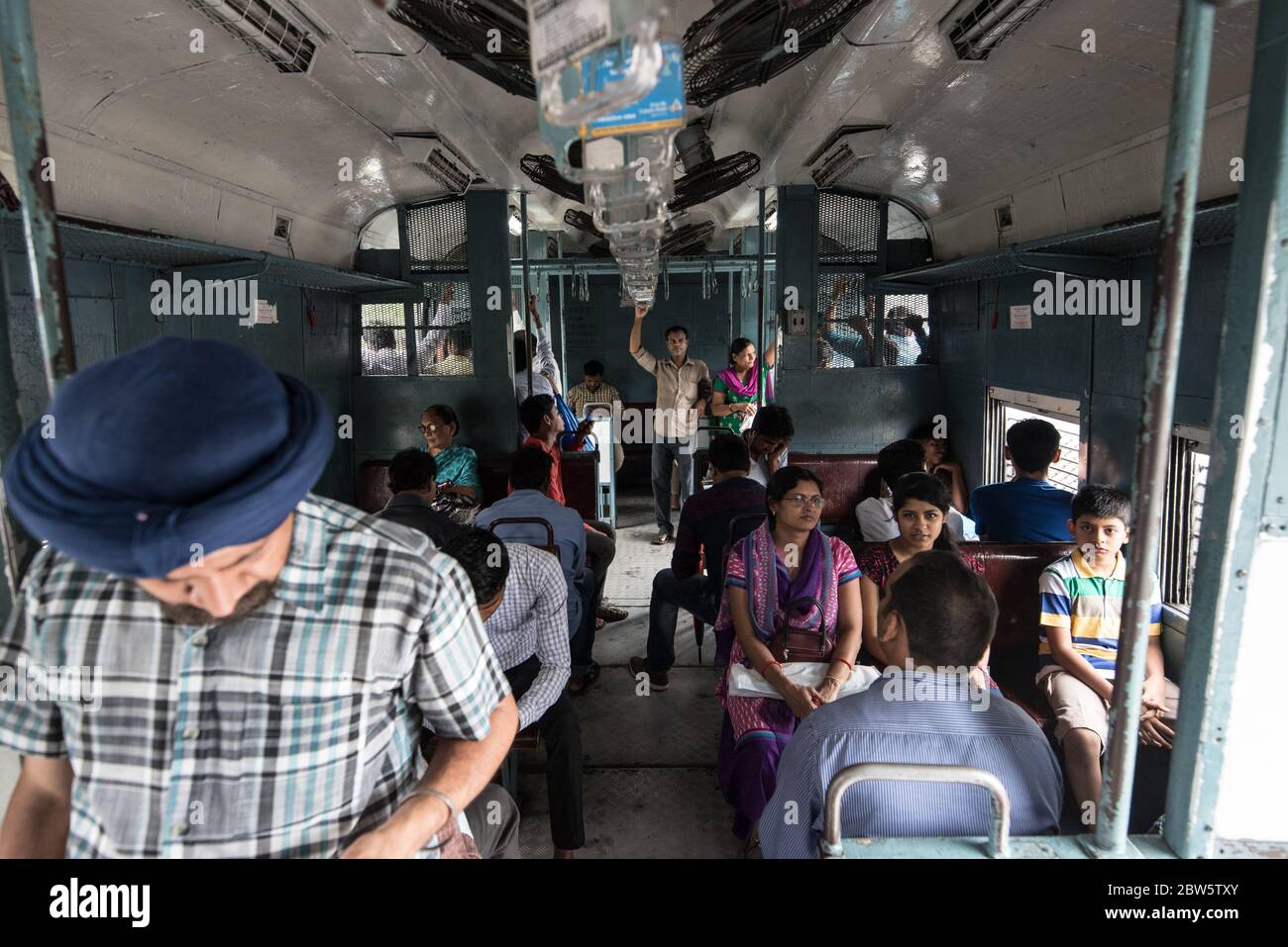 Passengers on crowded Mumbai commuter train. Mumbai, India Stock Photo ...
