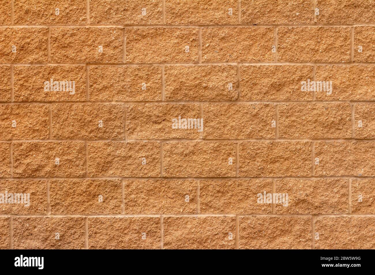 Modern concrete stone block wall background with attractive rough ...