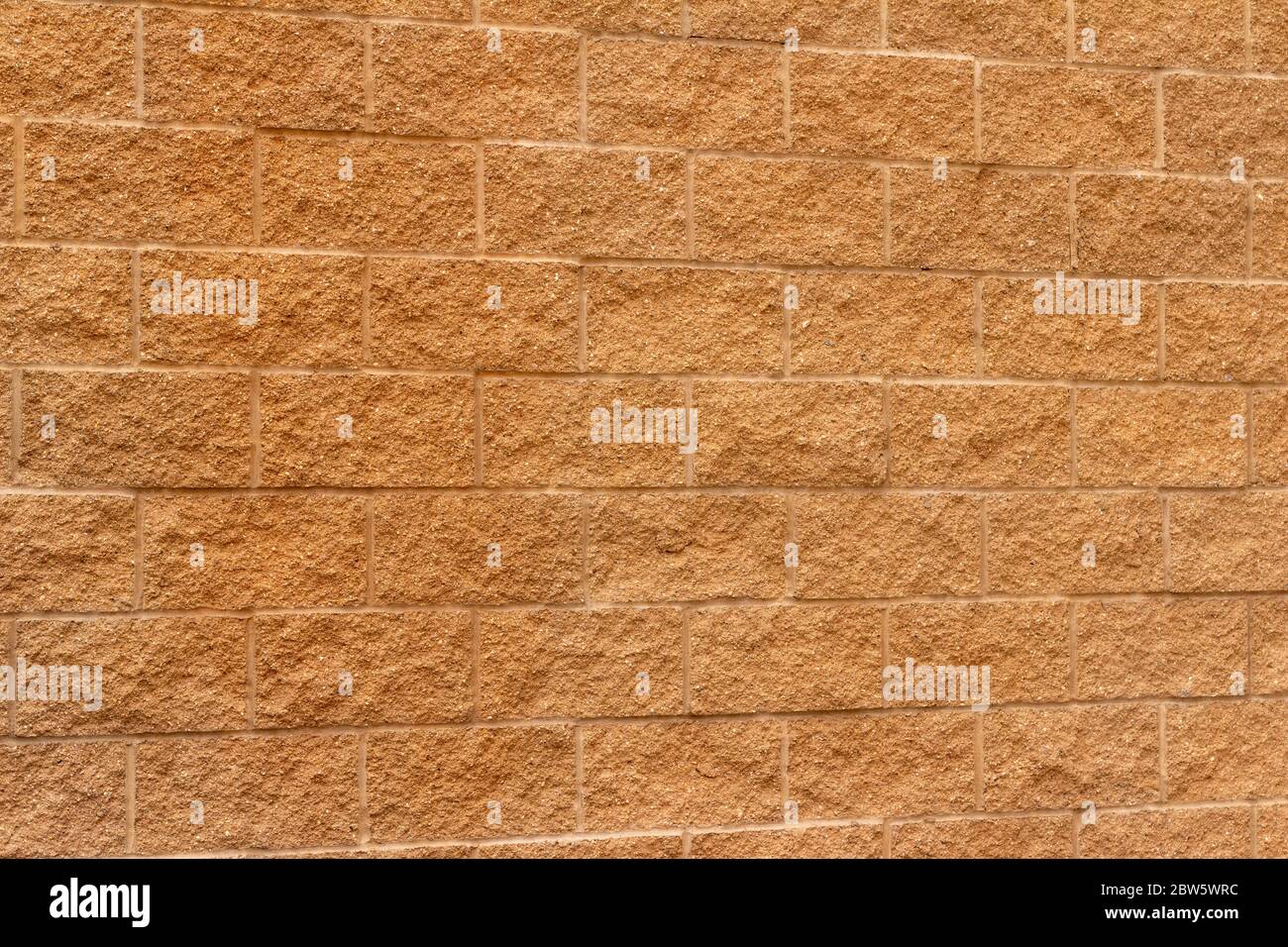 Modern concrete stone block wall background with attractive rough ...