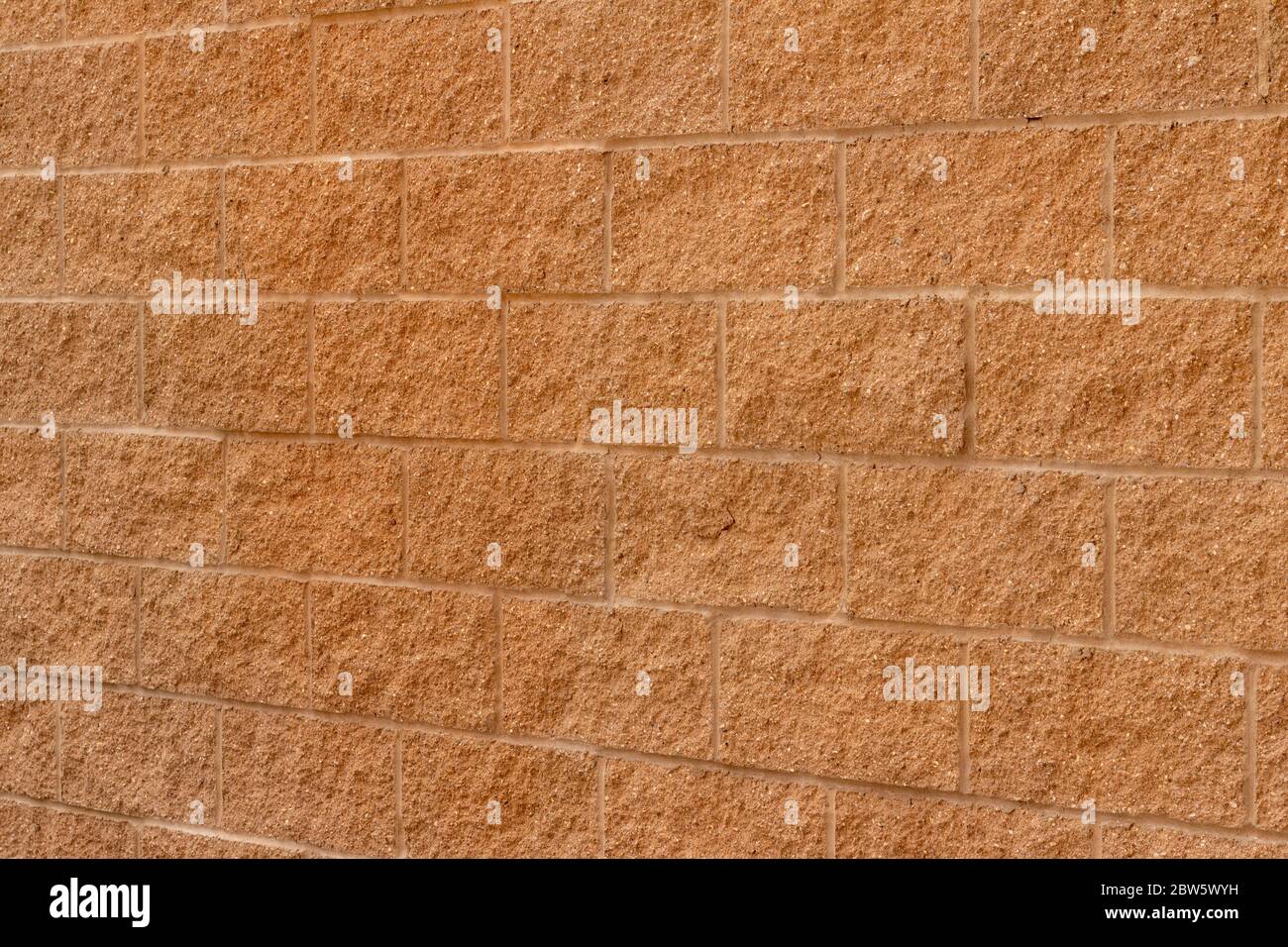 Modern concrete stone block wall background with attractive rough ...