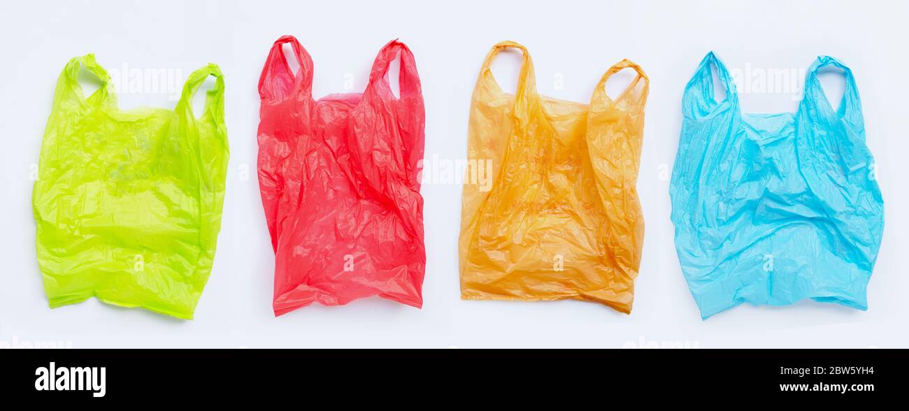 Colorful plastic bags on white background Stock Photo - Alamy