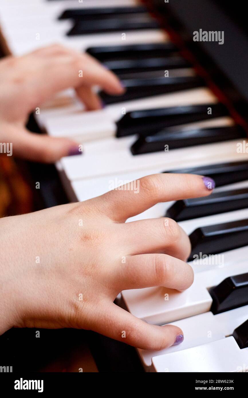 Hands playing classical piano hi-res stock photography and images - Alamy