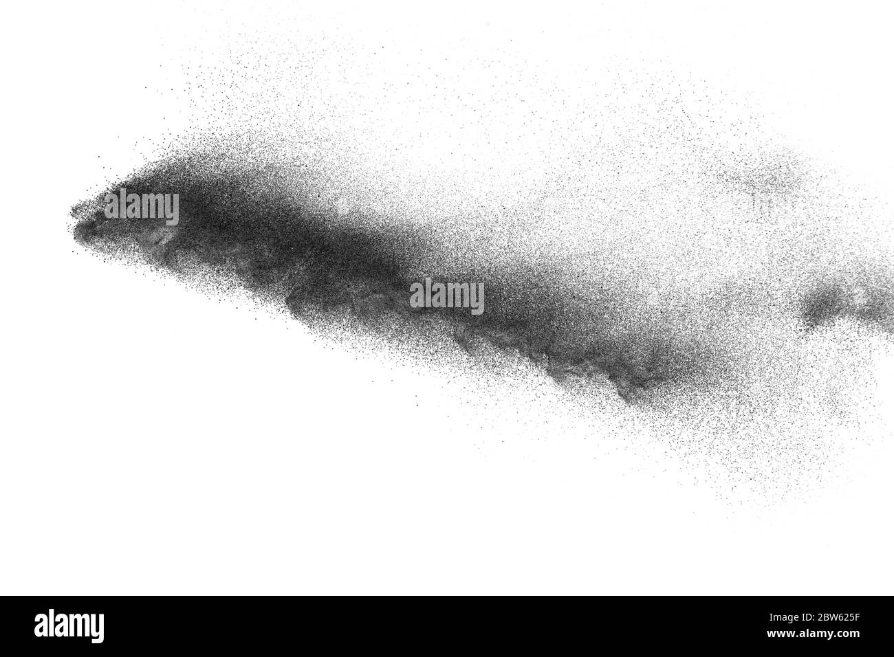 Black powder explosion against white background. Black dust particles ...