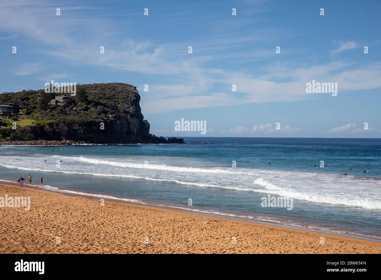 Avalon Beach in Sydney , view of the headland and people in the water ...