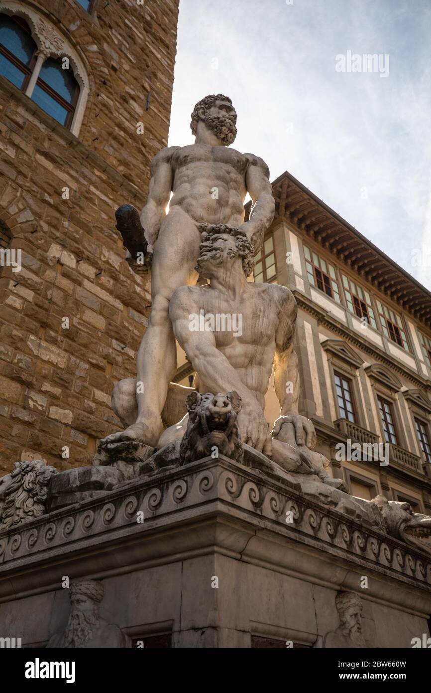A large stone statue in front of a building Stock Photo - Alamy