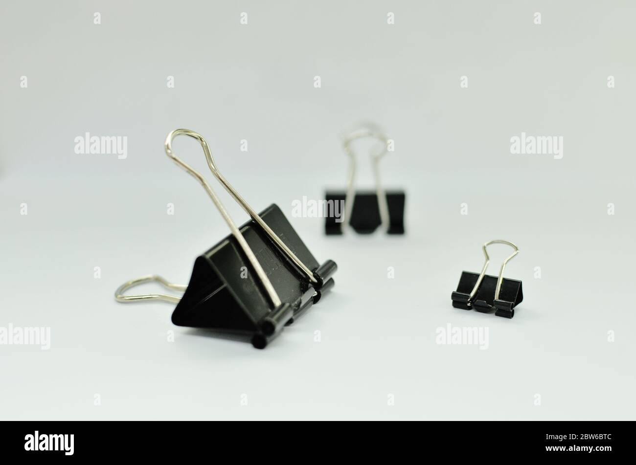 Paper clip over white background Stock Photo - Alamy