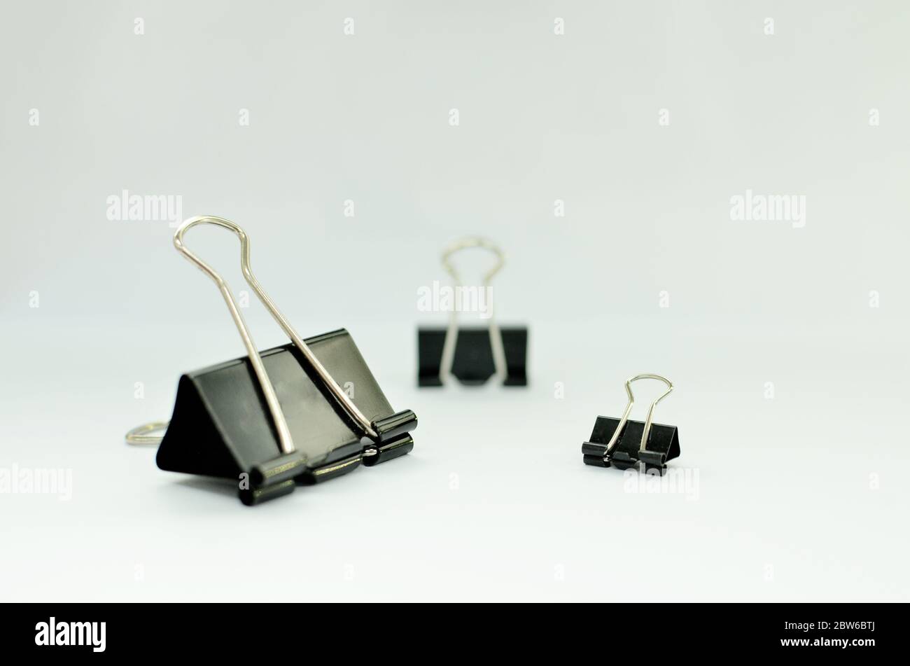 Paper clip over white background Stock Photo - Alamy