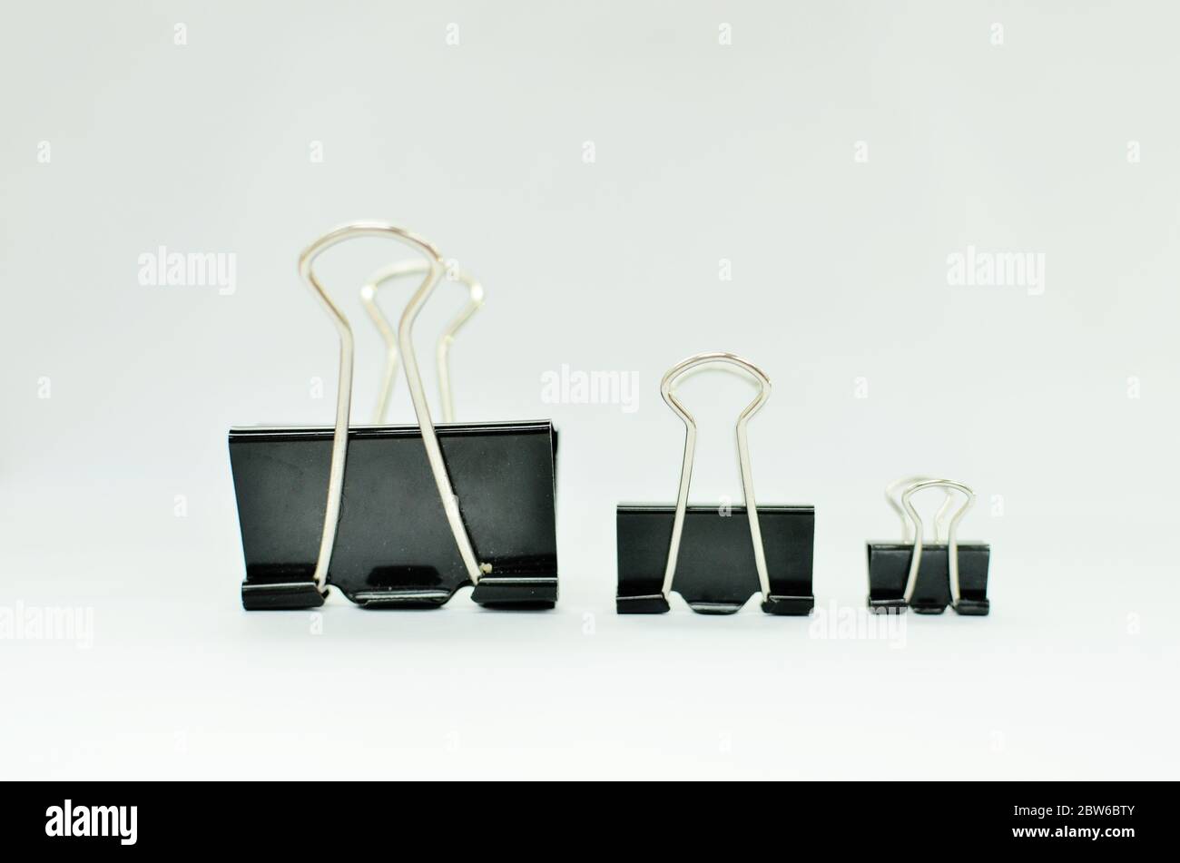 Paper clip over white background Stock Photo - Alamy