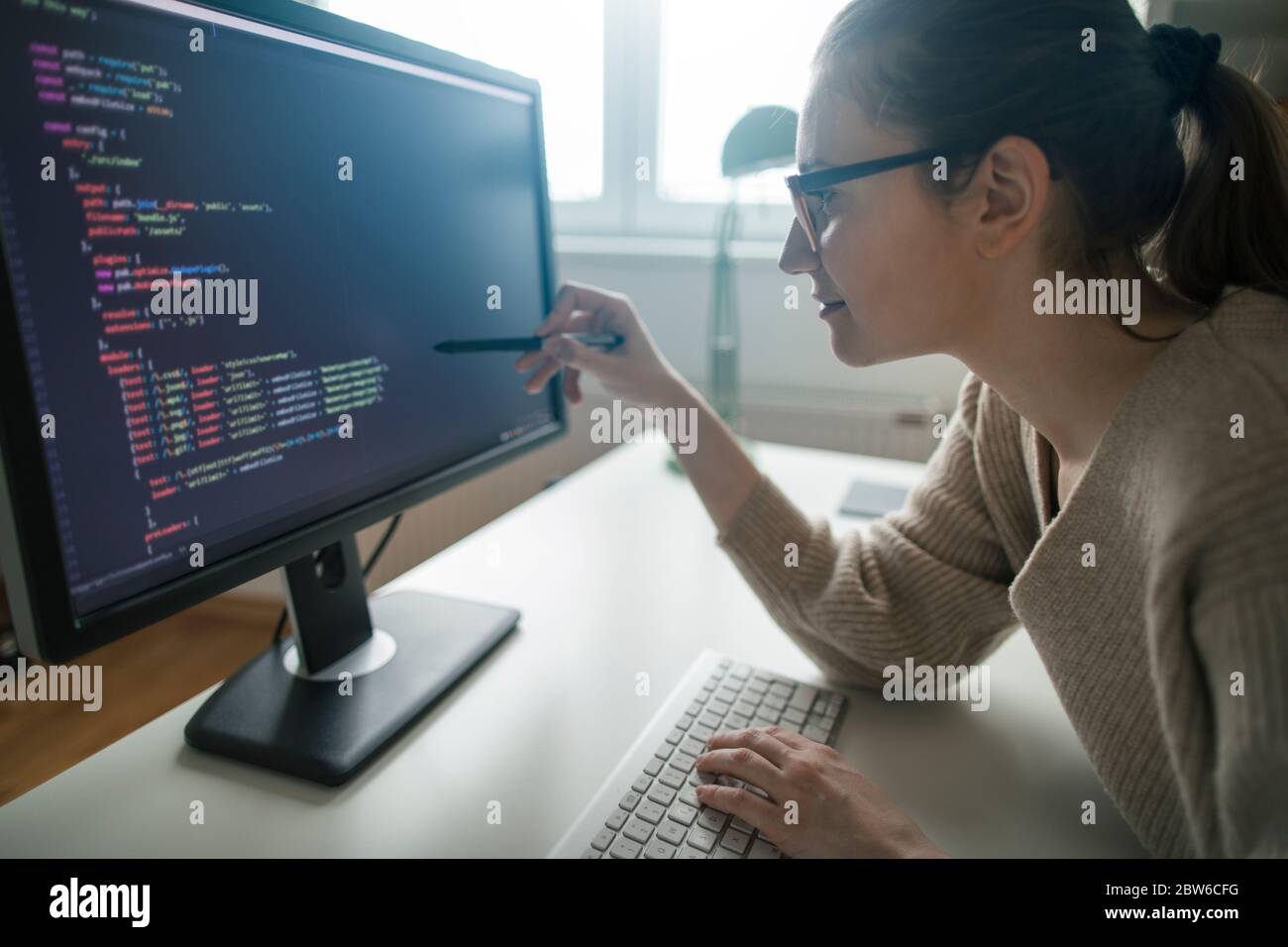 Programming codes female hi-res stock photography and images - Alamy