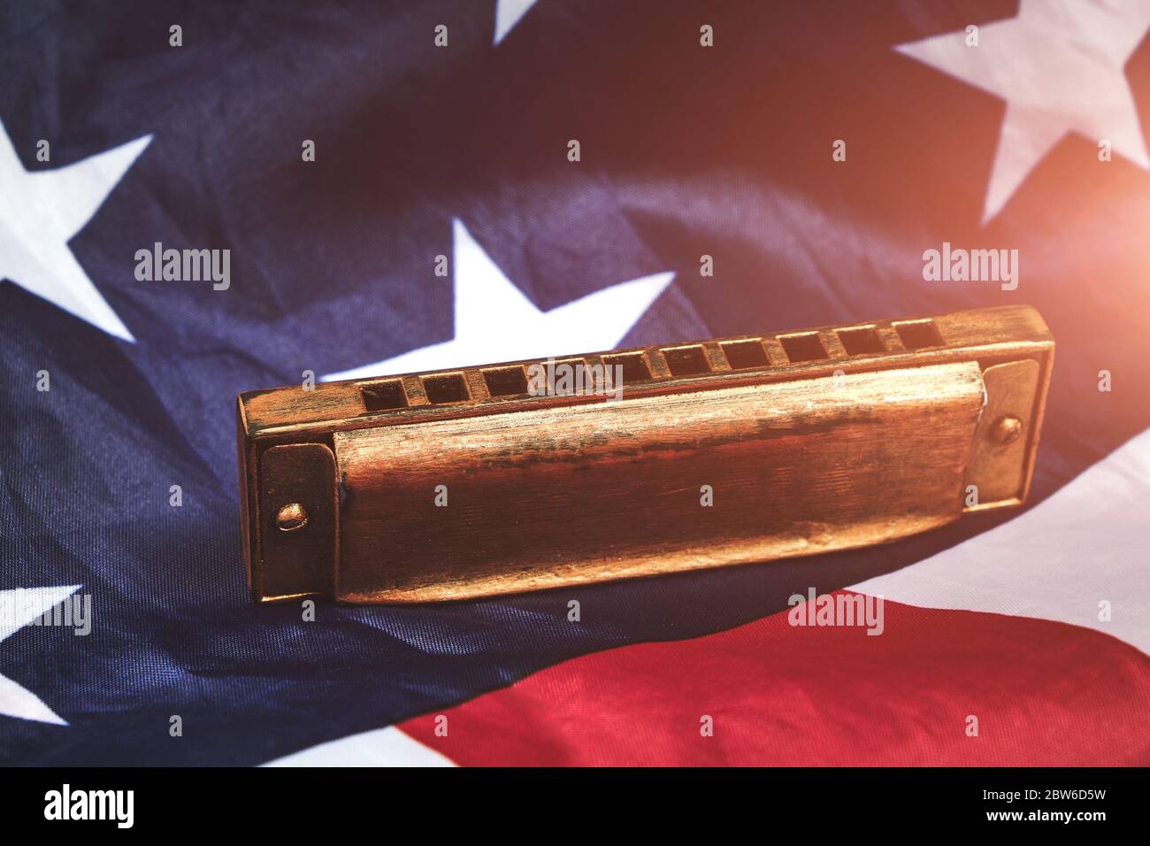 Harmonica on background of the flag of the United States of America ...