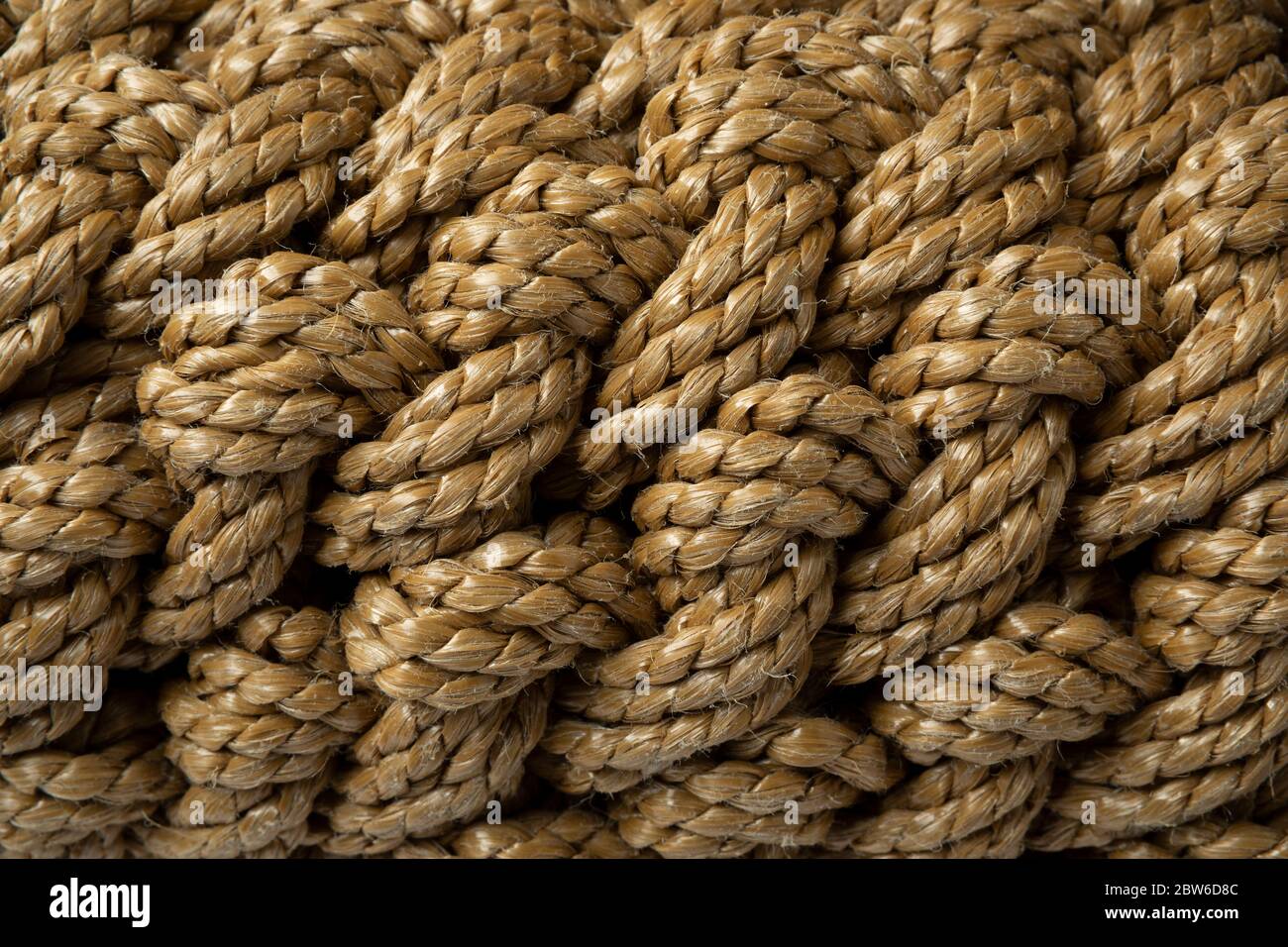 New handmade knotted rope close up full frame Stock Photo - Alamy