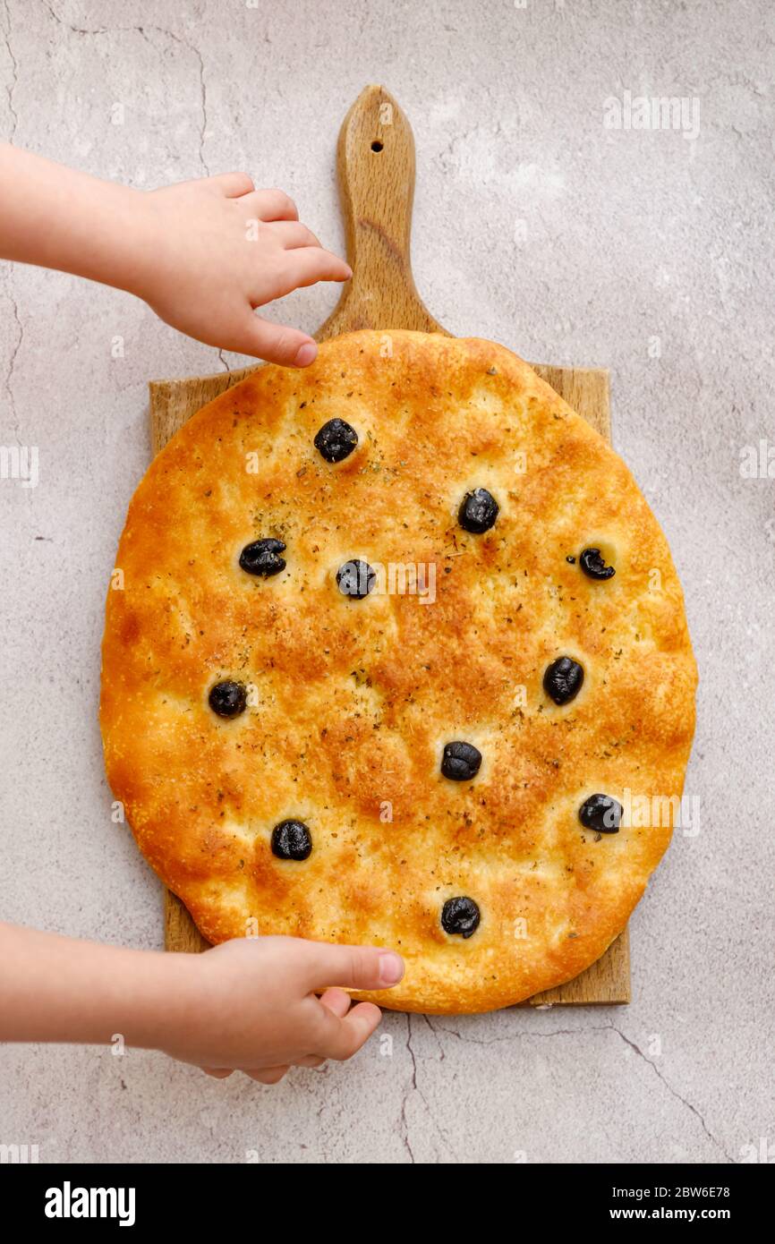 Homemade italian focaccia in rustic style on stone background. Healthy ...