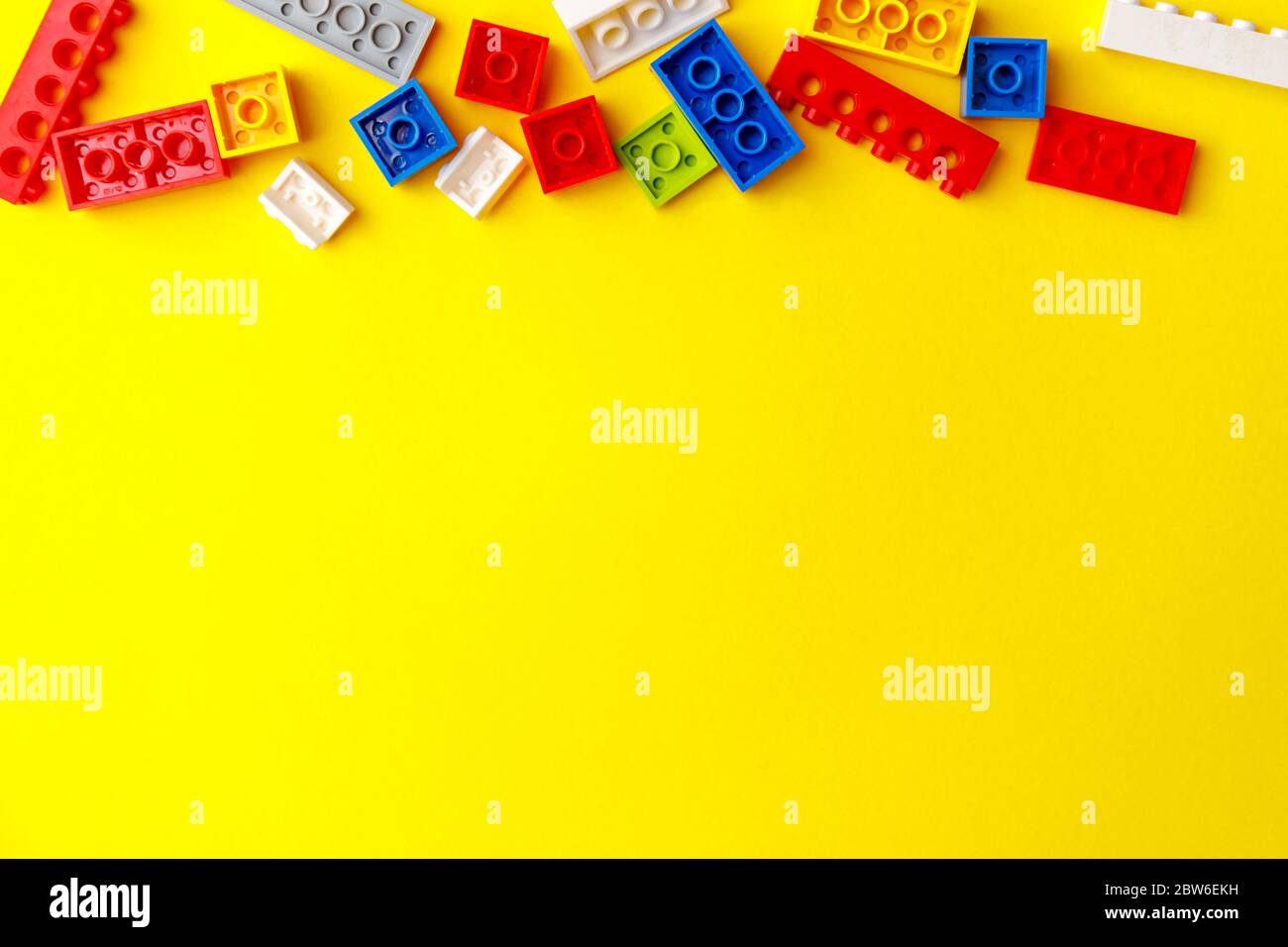 Colorful construction bricks for kids. Preschool activity with little ...