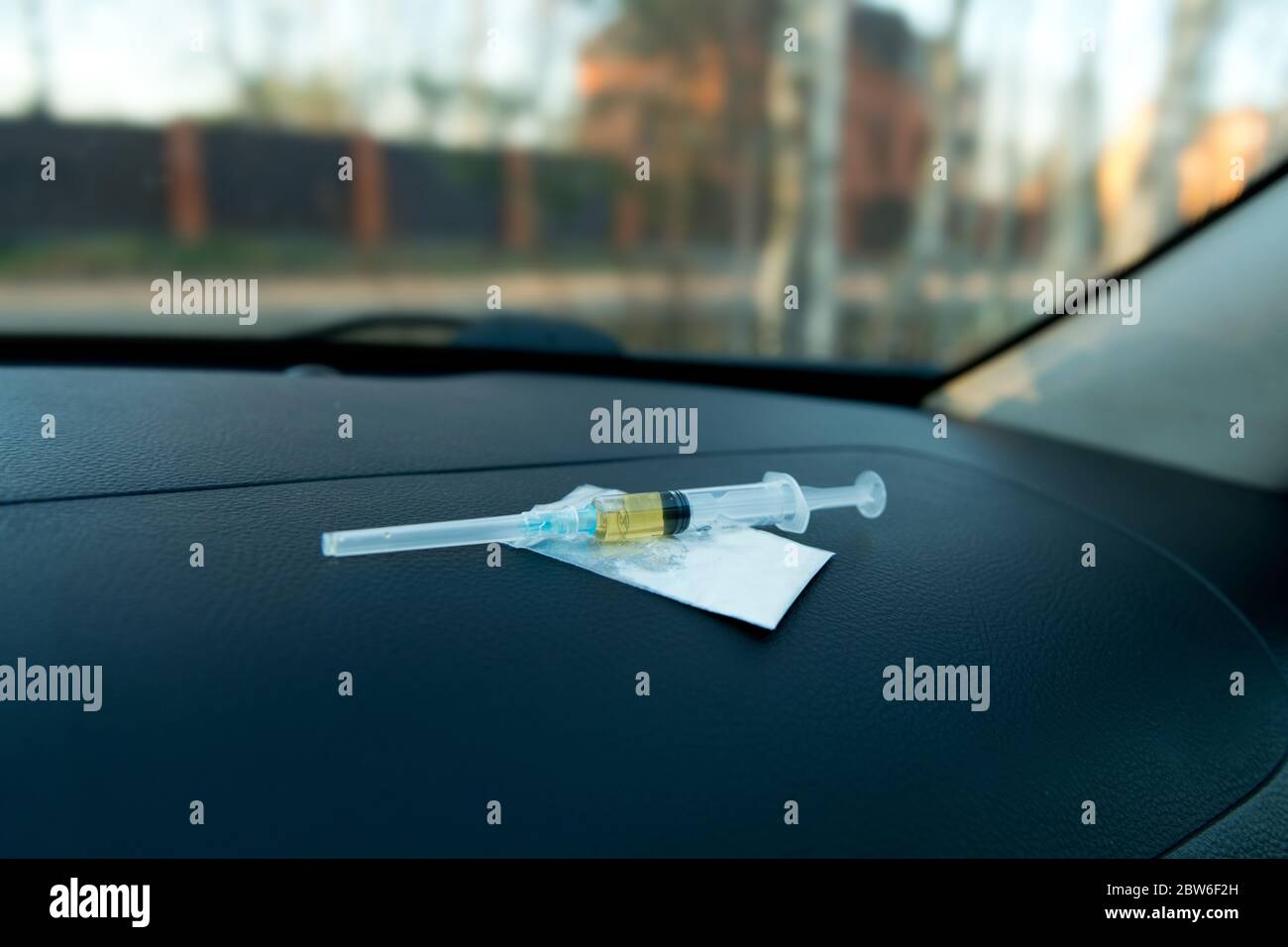 the drugs lie on the dashboard of the car Stock Photo - Alamy