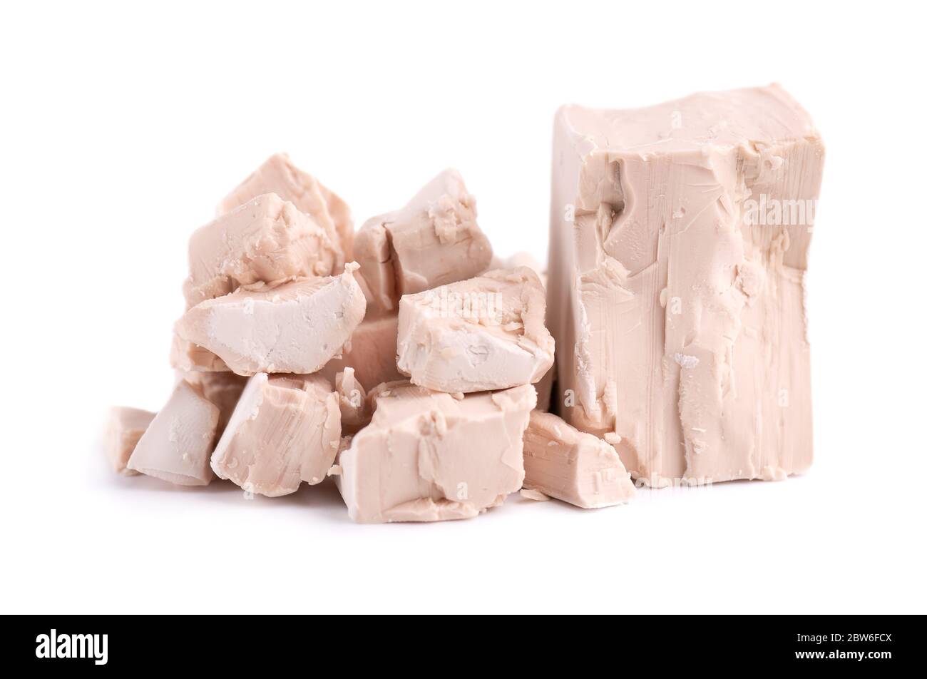 Fresh pressed yeast, isolated on white background. Compressed fresh ...