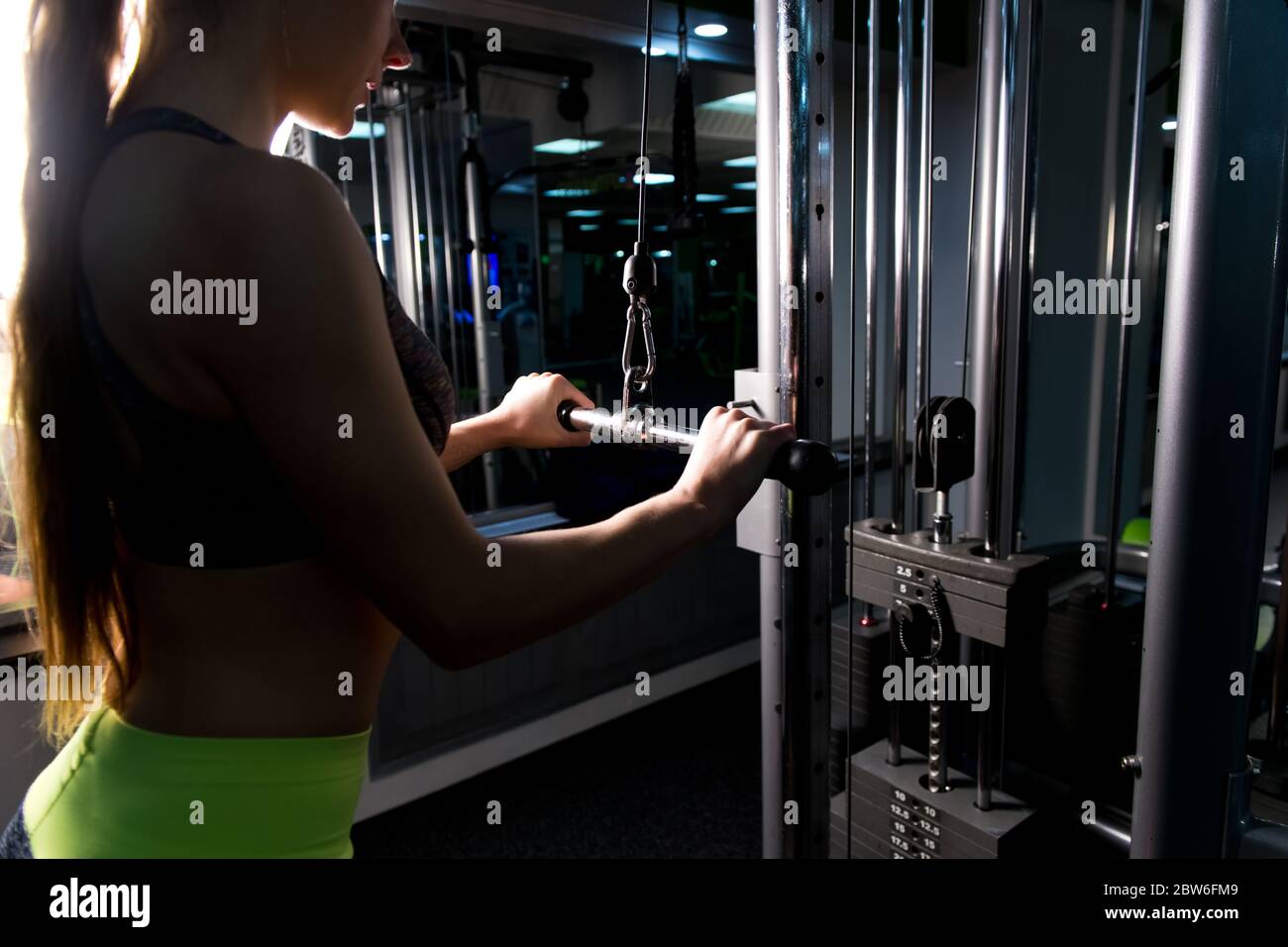 girl performs traction of the upper block in the gym Stock Photo - Alamy