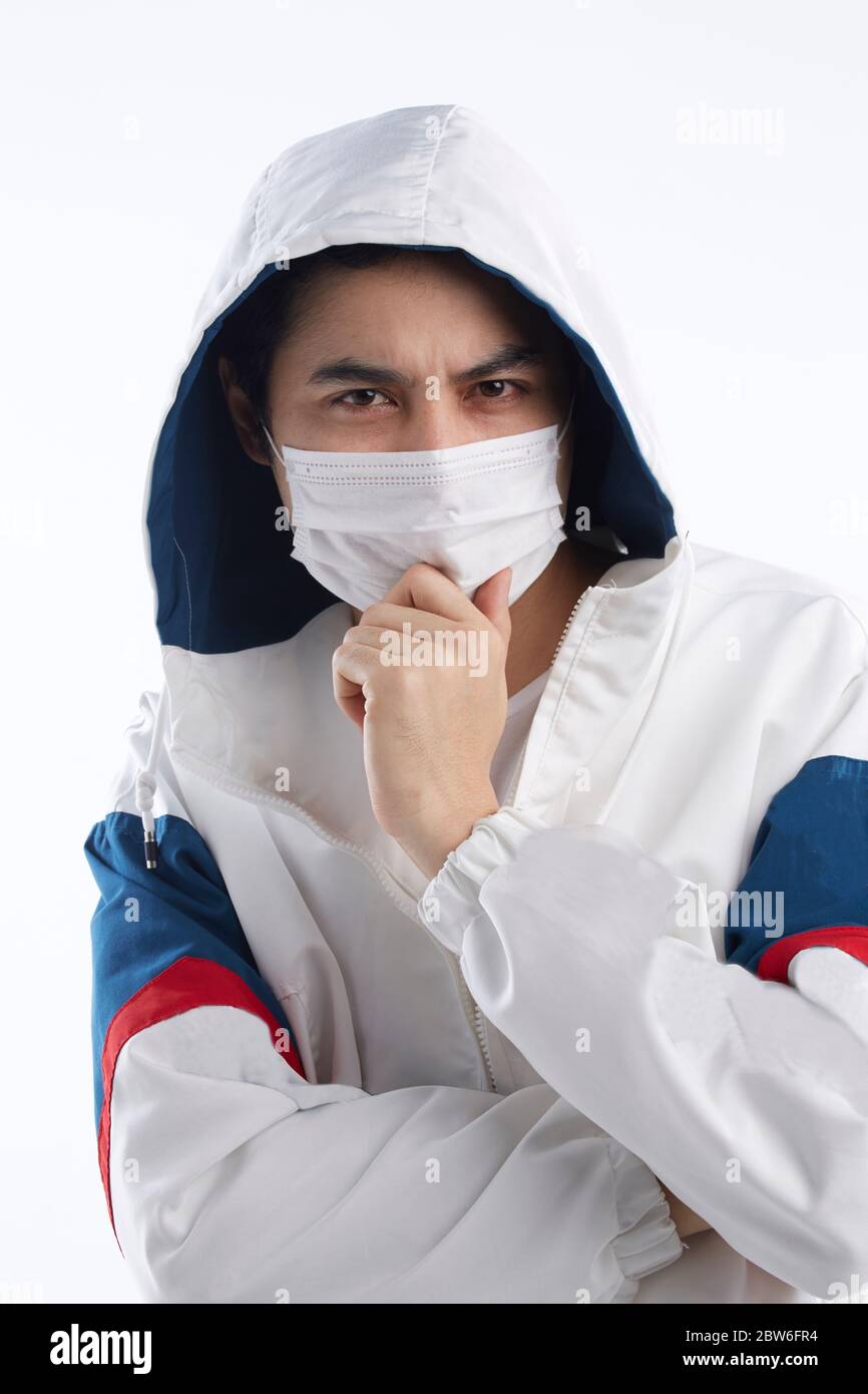 A man wear white mask and look to camera Stock Photo - Alamy