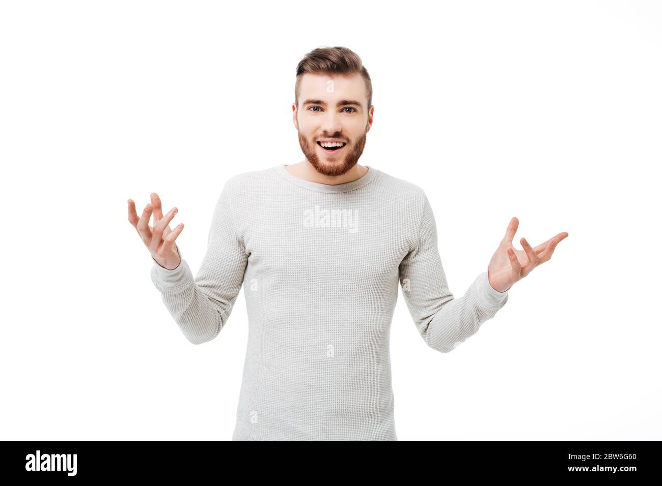 Portrait of handsome cheerful and surprised man isolated. Shocked guy ...