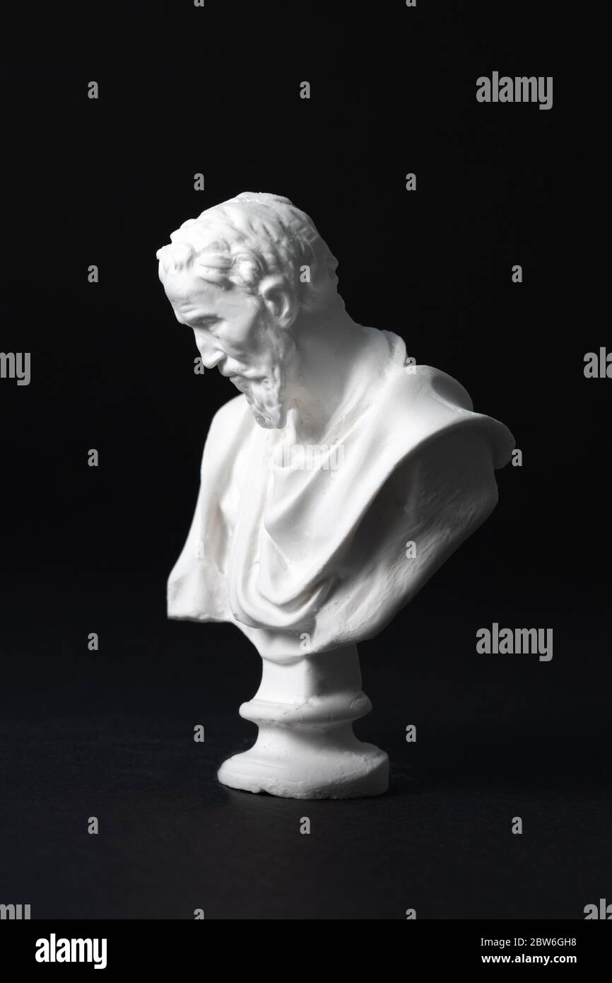 Michelangelo plaster figure in black background Stock Photo - Alamy