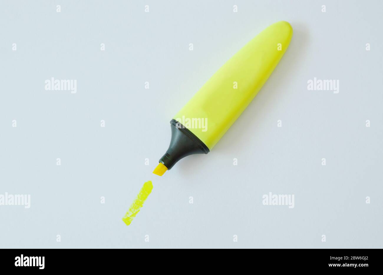 yellow highlight pen make line on white paper Stock Photo - Alamy