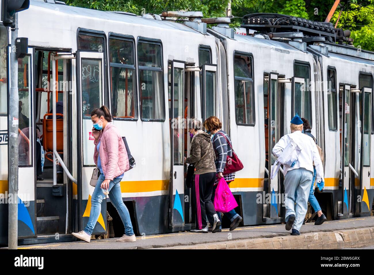 Person getting off bus hi-res stock photography and images - Alamy