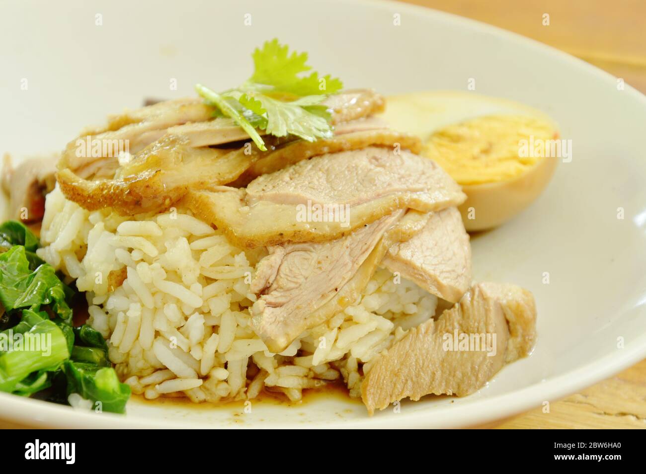 boiled duck meat slice dressing brown sauce with pickled cabbage on ...