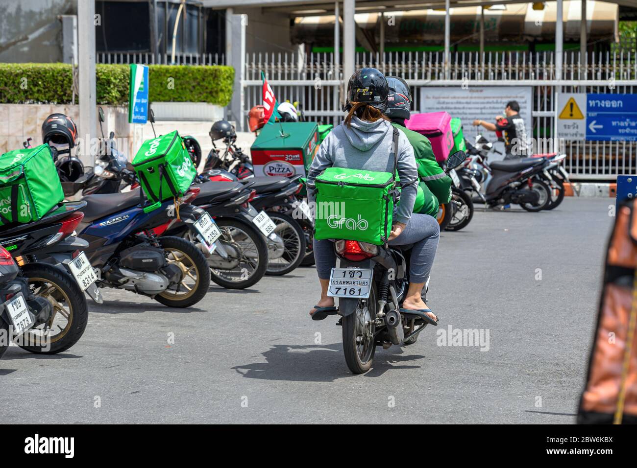BANGKOK, THAILAND - APRIL 2020 : Grab Food Bikers riding the motorcycle ...