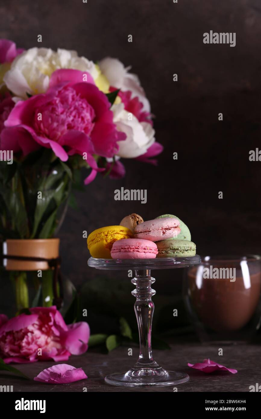 macaroons for dessert on a served table Stock Photo - Alamy