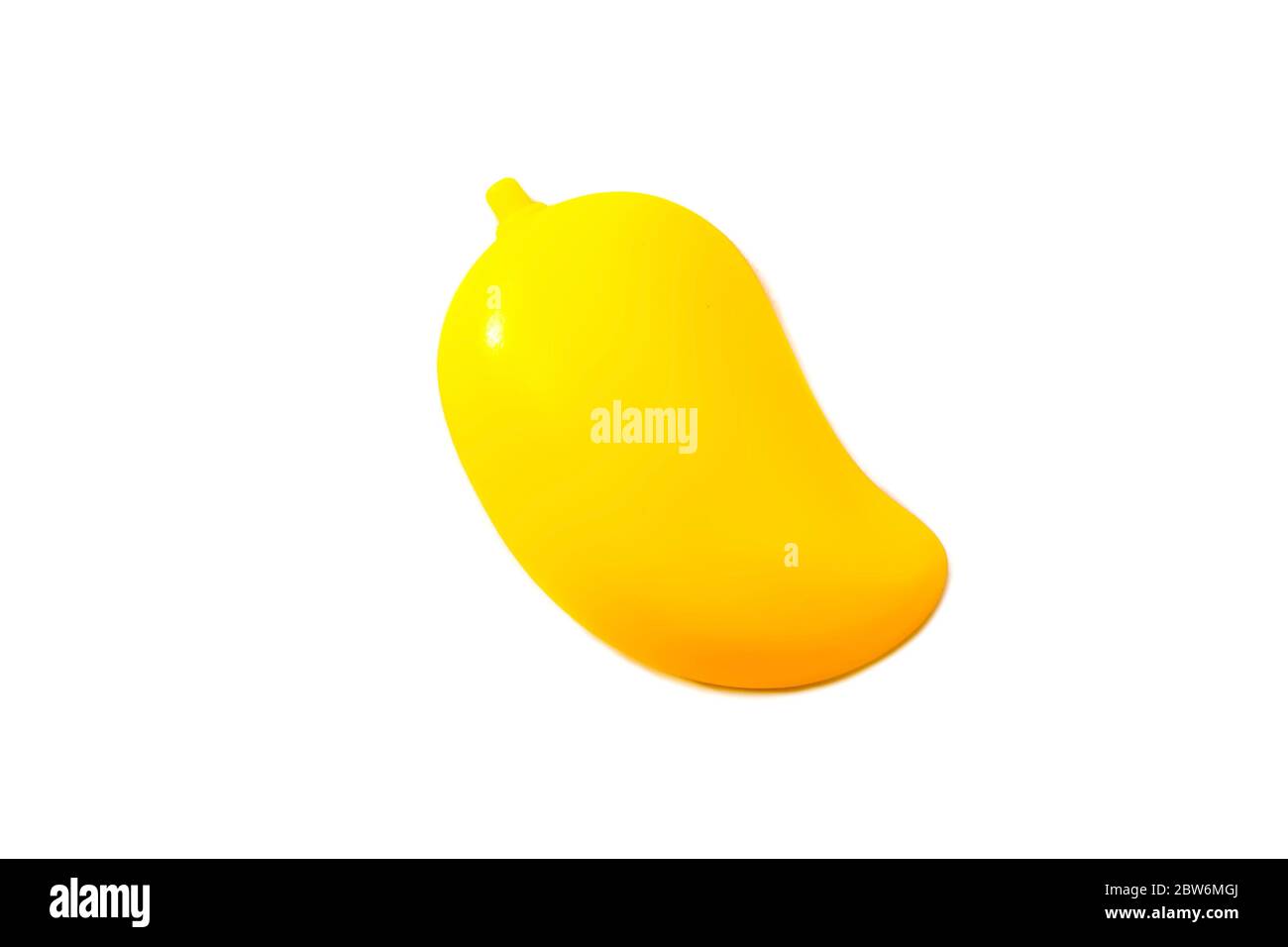 Mango. Toy plastic fruit isolated on white background. Plastic fruit ...