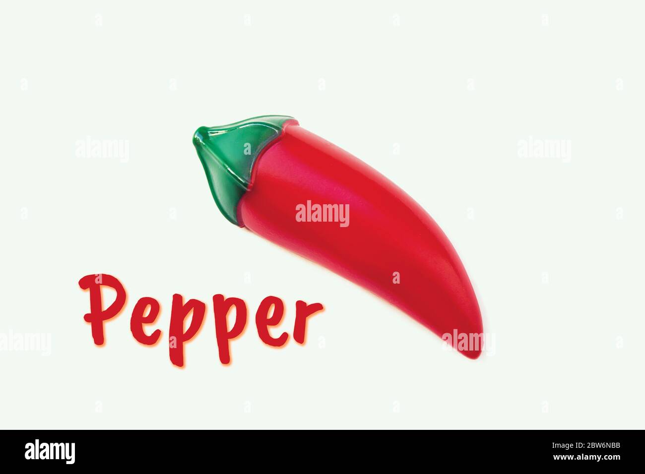 Pepper. Toy plastic vegetable isolated on white background. Plastic ...