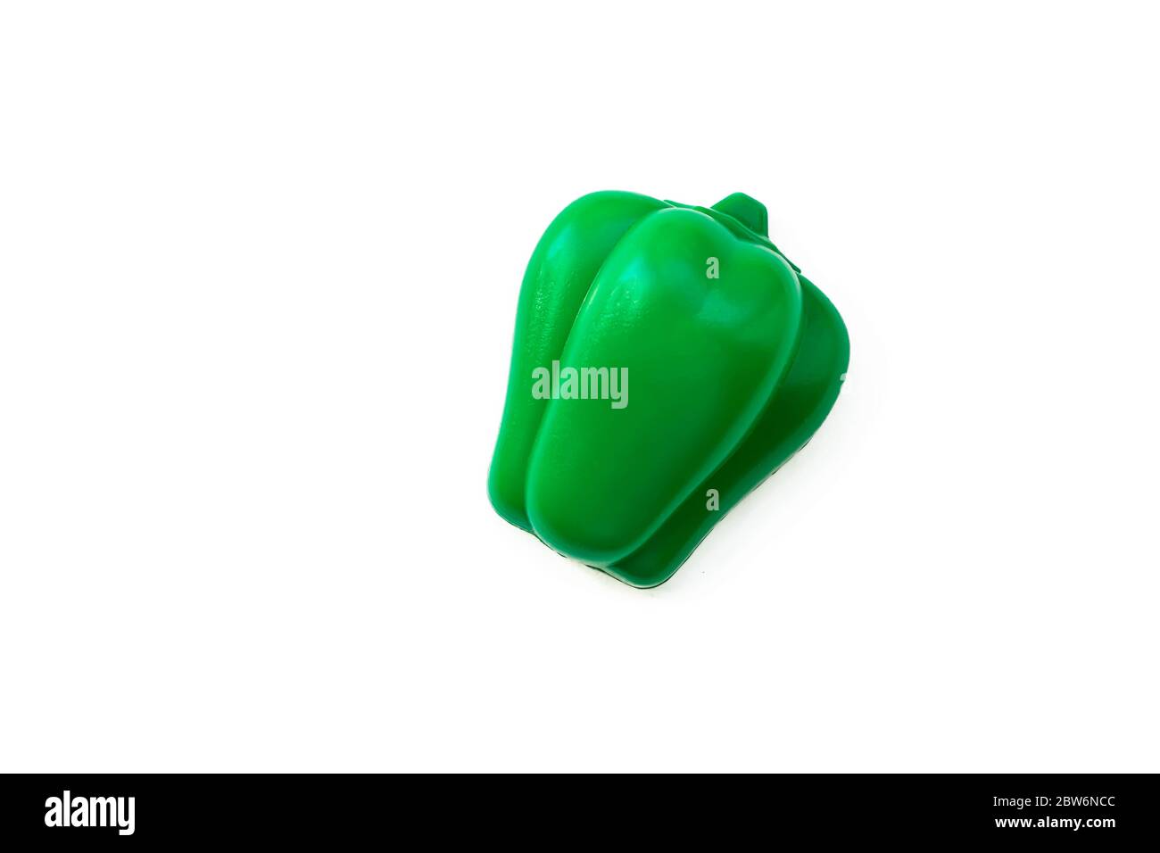 Pepper. Toy plastic vegetable isolated on white background. Plastic ...